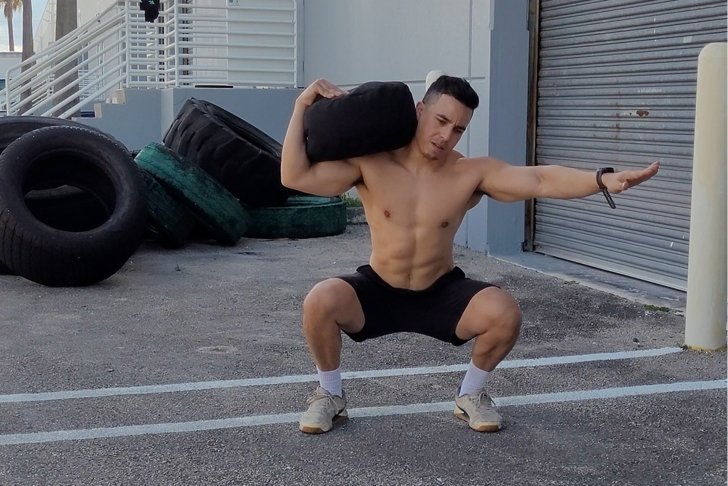 5 Reasons to Add the Strongman Sandbag to Your Training | Training Day Book